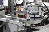 China 100 - 200pcs/min PLC Control Box Corner Pasting Machine for sale