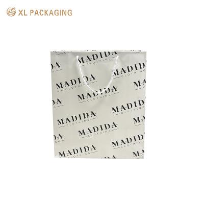 China Custom White Reusable Shopping Bag Customized Luxury Christmas Packaging Gift Bags art Paper Bags for sale