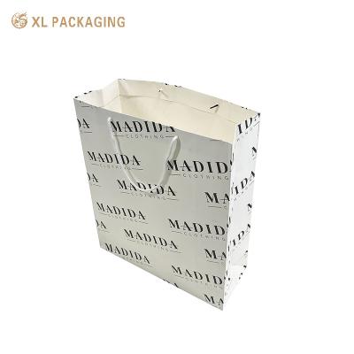 China XL Packaging Paper Bag Coated Paper White Color for Clothes Mall Shipping Bag Full Printing Shoes Packaging Hand Bag for sale