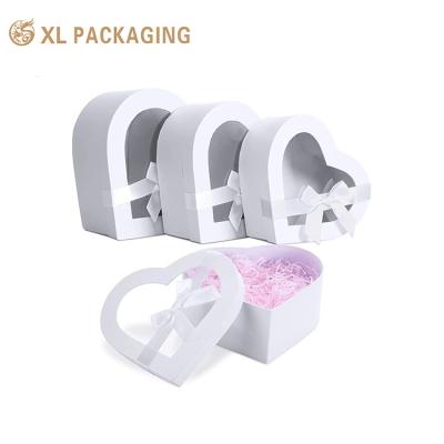 China Custom White Red Pink Cardboard Heart Shaped Paper Flower Carton Jewelry Chocolate Gift Packaging Box With Clear Window for sale