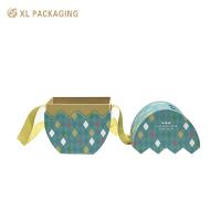 China Handmade Easter Egg Chocolate Gift Box Custom Embossed Silver Logo With Ribbon Decor Packaging Box for sale
