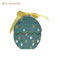 China Handmade Easter Egg Chocolate Gift Box Custom Embossed Silver Logo With Ribbon Decor Packaging Box for sale