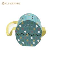 China Handmade Easter Egg Chocolate Gift Box Custom Embossed Silver Logo With Ribbon Decor Packaging Box for sale