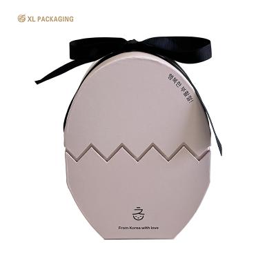 China XL Packaging Custom Luxury Boxes Fancy Pink Egg Shaped Chocolate Paper Gift Boxes Packaging For Easter With Ribbon for sale