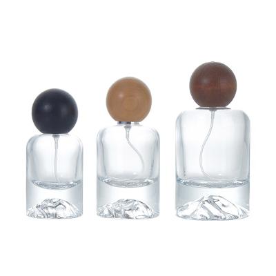 China Custom Crystal 30ml 50ml  Glass Perfume Bottles | Luxury Hand-polished Gold-stamped Logo | B2B Wholesale for sale