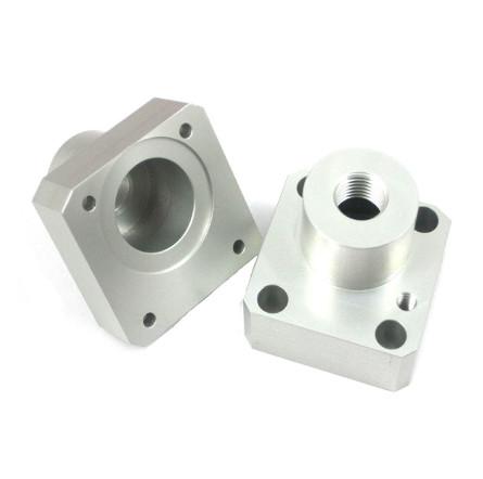 Close-up view of CNC machined stainless steel component with smooth surface finish