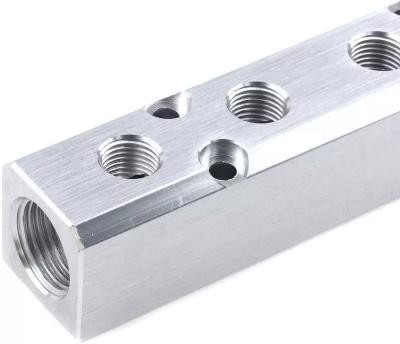 China Customized 4 Port Manifold Block CNC Machined Aluminum Hard Anodized Silver ISO13485 AS9100 Certified for sale