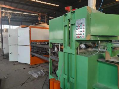 China Máquina para hacer bandejas de papel fruta manzana bandejas de huevo máquina de cartón de huevo máquina de moldeo de pulpa máquina con mantenimiento de larga duración en venta
