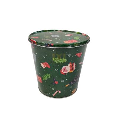 China Snack Pail Food Tub Christmas Themed Gloss Frosted Texture Commemorative Day Gift Lid Sealing Promotional Popcorn Tin Bucket for sale