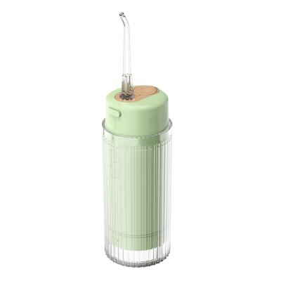 Cina Mini idropulsore portatile 2000mAh ABS+PP 14,1*7,4*4,9 cm meno di 65 dB di rumore in vendita