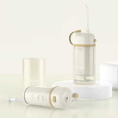 Cina Mini Flosser d'acqua portatile ed efficiente - Capacità della batteria 1400mAh in vendita