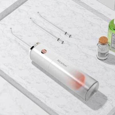 China Limpeza profunda portátil de Sonic Cordless Water Flosser Rechargeable com quatro bocais à venda