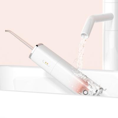 China Limpeza profunda portátil de Sonic Cordless Water Flosser Rechargeable com quatro bocais à venda