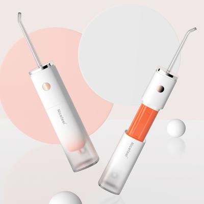 China Limpeza profunda portátil de Sonic Cordless Water Flosser Rechargeable com quatro bocais à venda