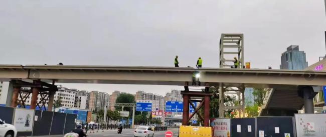 Steel bridge installation team at work