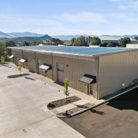 China Versatile Steel Structure Warehouse Building Workshop H Frame Section Column Construction for sale