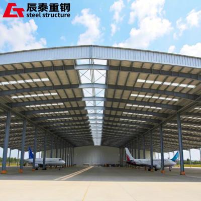 中国 Q355 Q235 プレハブ金属飛行機格納庫 産業用鉄骨倉庫建設 販売のため