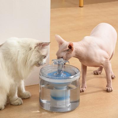 China 2.6L Fully Transparent Eco-Friendly Silent Charge Rounded Water Dispenser Stylish Plastic Automatic Pet Cat Dog Bowls Feeders for sale