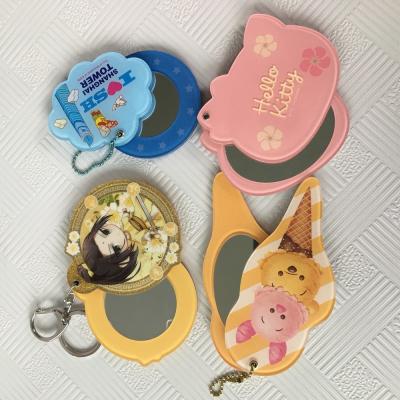 Cina Specchio compatto di singolo anime di plastica laterale, piccolo specchio di trucco per la borsa in vendita