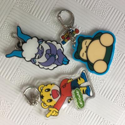 Cina Factory Cheap Custom Anime Cartoon Transparent Epoxy Resin Glitter Acrylic Charms Key chains in vendita