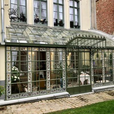 China Hierro forjado Cuatro estaciones Sala de sol Casas de vidrio Invernadero de metal Villa Entrada Puertas Salón moderno Diseño personalizado en venta