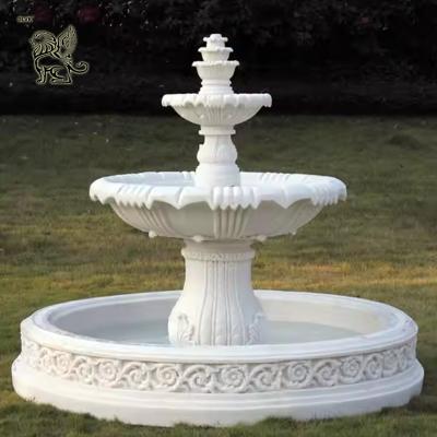 China Fuente de agua de mármol de 3 niveles Fuente redonda blanca de talla a mano Decoración de jardín al aire libre a medida en venta