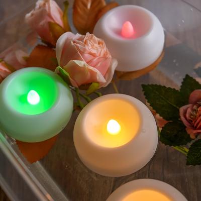 China Glossy Floating Water Candle Warm White Flickering Tealight Candles 200 Hours 24 Pack for sale
