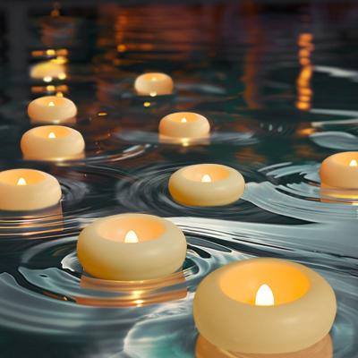 China Glossy Water Activated Floating Candles 2.3 Inch White Floating Candle Waterproof for sale