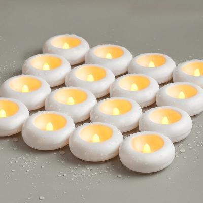 China Rechargeable Waterproof Flameless Floating Candles Plastic Tea Light Votive Candles White for sale
