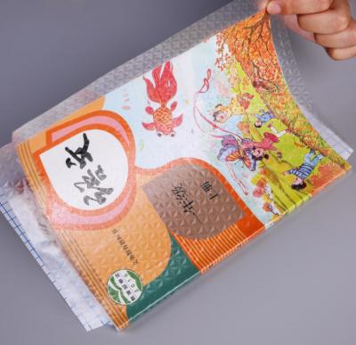 Cina film autoadesivo protettivo della copertura del libro di 53x37.5cm chiaro in vendita