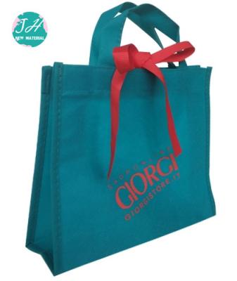 Cina 25*30cm Flexo che stampa le borse variopinte del regalo di Chrismas, hanno laminato la borsa non tessuta in vendita
