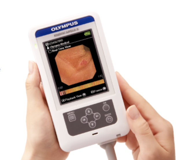 Olympus ENDOCAPSULE 10 System showing capsule and monitoring equipment