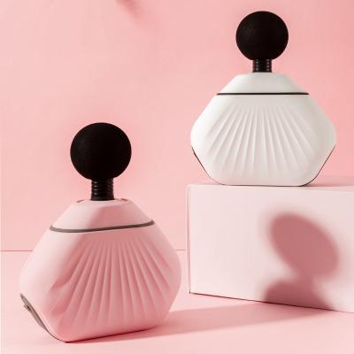 Cina White And Pink Seashell Mini sport muscle massager Wireless Body Relaxation Massager in vendita