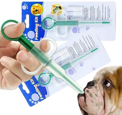 Cina Tiratore felino di plastica della pillola per Cat Silicone Syringe in vendita