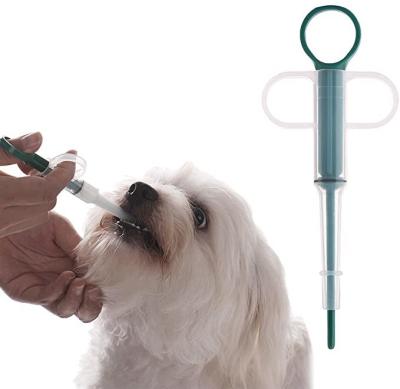 Cina Tiratore felino di plastica della pillola per Cat Silicone Syringe in vendita