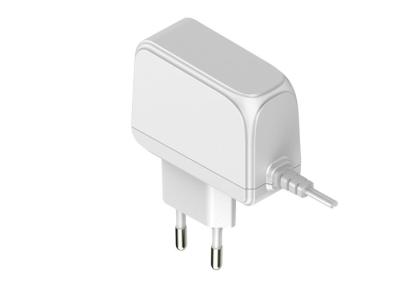Cina adattatore bianco di corrente continua di CA della spina di 12V 1.5A UE per l'apparecchio del decoder in vendita