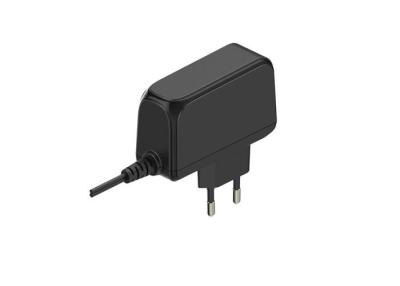 Cina adattatore di corrente continua di CA di 12V 2A con la spina di UE, alimentazione elettrica di commutazione del supporto della parete in vendita