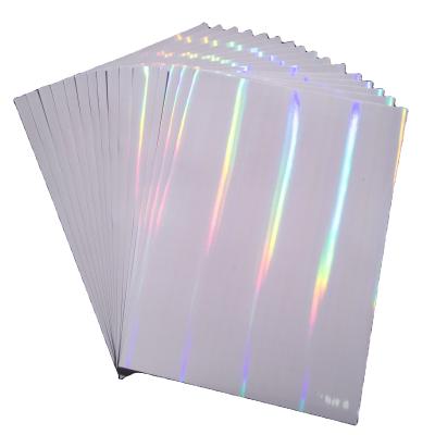 China Hot Selling A4 Size Clear Self Adhesive Waterproof Good Adhesive Pillar of Light Holographic Cold Lamination Film for sale