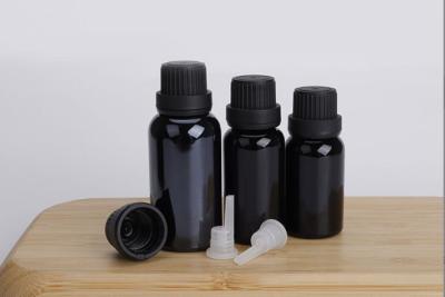 Cina Bottiglia di vetro cosmetica essenziale nera della bottiglia di olio 5g 10g 15g 20g 30g 50g 100g con il cappuccio in vendita