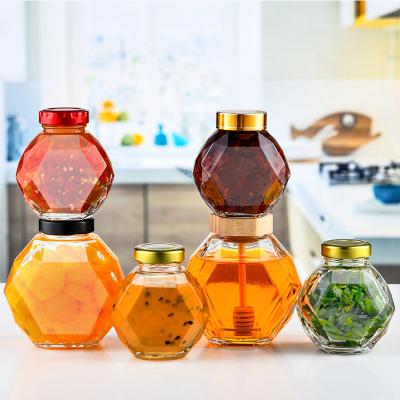中国 H11.7cmのダイヤモンドは蜂蜜の瓶500mlのこはく色のガラス瓶の木のふたを形づける 販売のため
