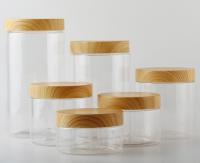 China Cosmetic Clear Plastic Storage Jar Empty Refillable With Bamboo Cap for sale