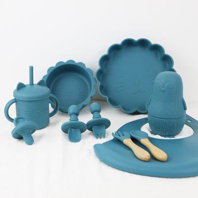 Cina Il bambino all'ingrosso Geschirr ha condotto il prodotto d'alimentazione dell'insieme delle stoviglie del bambino del silicone del piatto della ciotola del cucchiaio della ciotola del cucchiaio della busbana francese del silicone di svezzamento in vendita