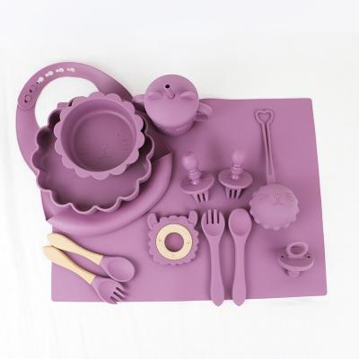 Cina Il bambino all'ingrosso Geschirr ha condotto il prodotto d'alimentazione dell'insieme delle stoviglie del bambino del silicone del piatto della ciotola del cucchiaio della ciotola del cucchiaio della busbana francese del silicone di svezzamento in vendita