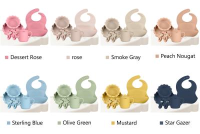 Cina Il bambino all'ingrosso Geschirr ha condotto il prodotto d'alimentazione dell'insieme delle stoviglie del bambino del silicone del piatto della ciotola del cucchiaio della ciotola del cucchiaio della busbana francese del silicone di svezzamento in vendita