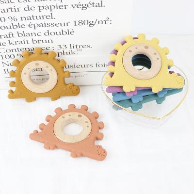 Cina Polsino di legno dei giocattoli dei multi di colore bambini del silicone per l'infante in vendita