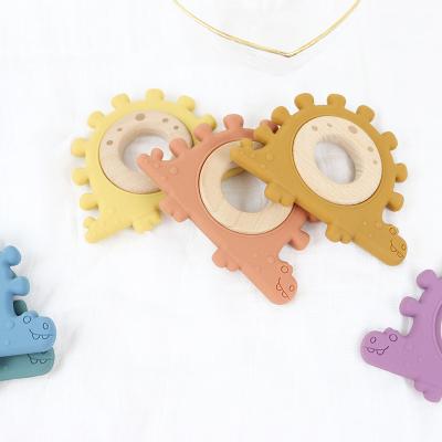 Cina Polsino di legno dei giocattoli dei multi di colore bambini del silicone per l'infante in vendita