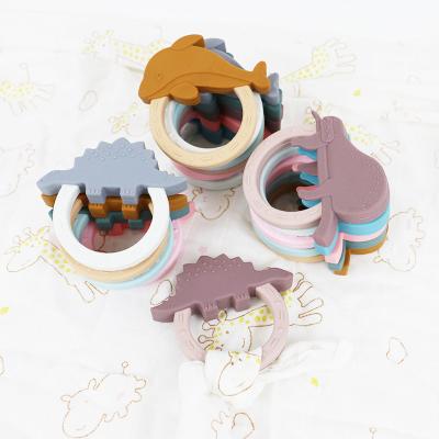 China Cartoon Silicone Baby Teether Toy With Penguin Unicorn Raccoon Shape for sale