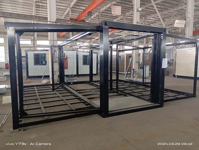 Grande expandable shipping container house frame
