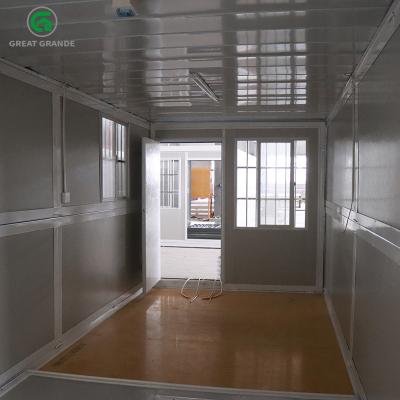 中国 Left Window Steel Prefab Folding Container House For Temporary Housing Camping 販売のため