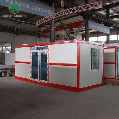 Китай Противоударная стальная Prefab складывая рамка контейнера домашняя красная с бортовой стеклянной дверью продается